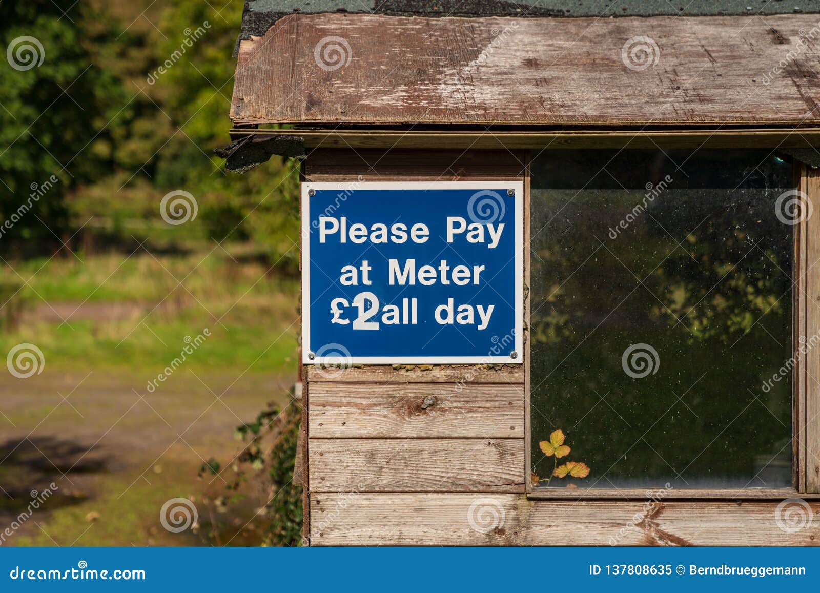 Sign: Please pay at meter stock image. Image of britain - 137808635