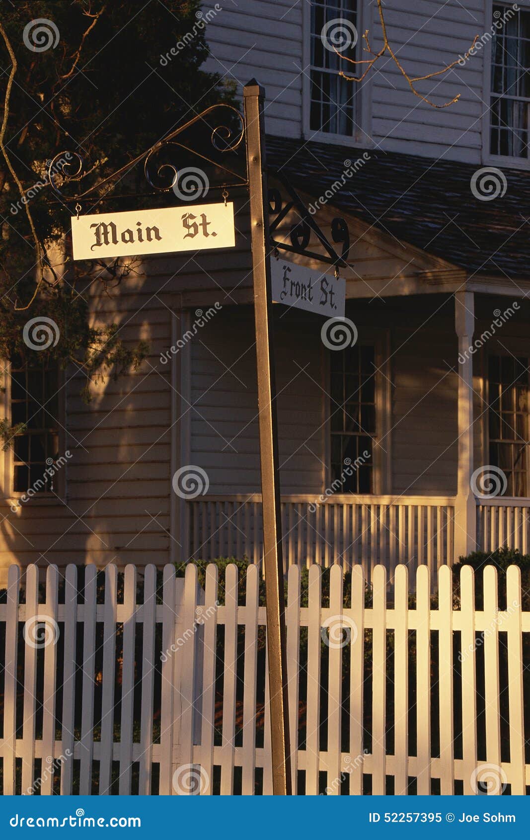 Sign Post at Corner of Main St. and Front St Stock Image - Image of ...