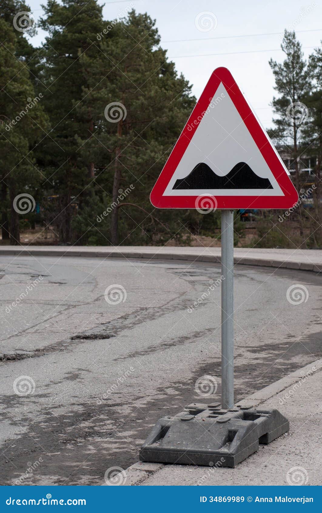 Sign and Potholes on the Road Stock Image - Image of danger, pavement ...