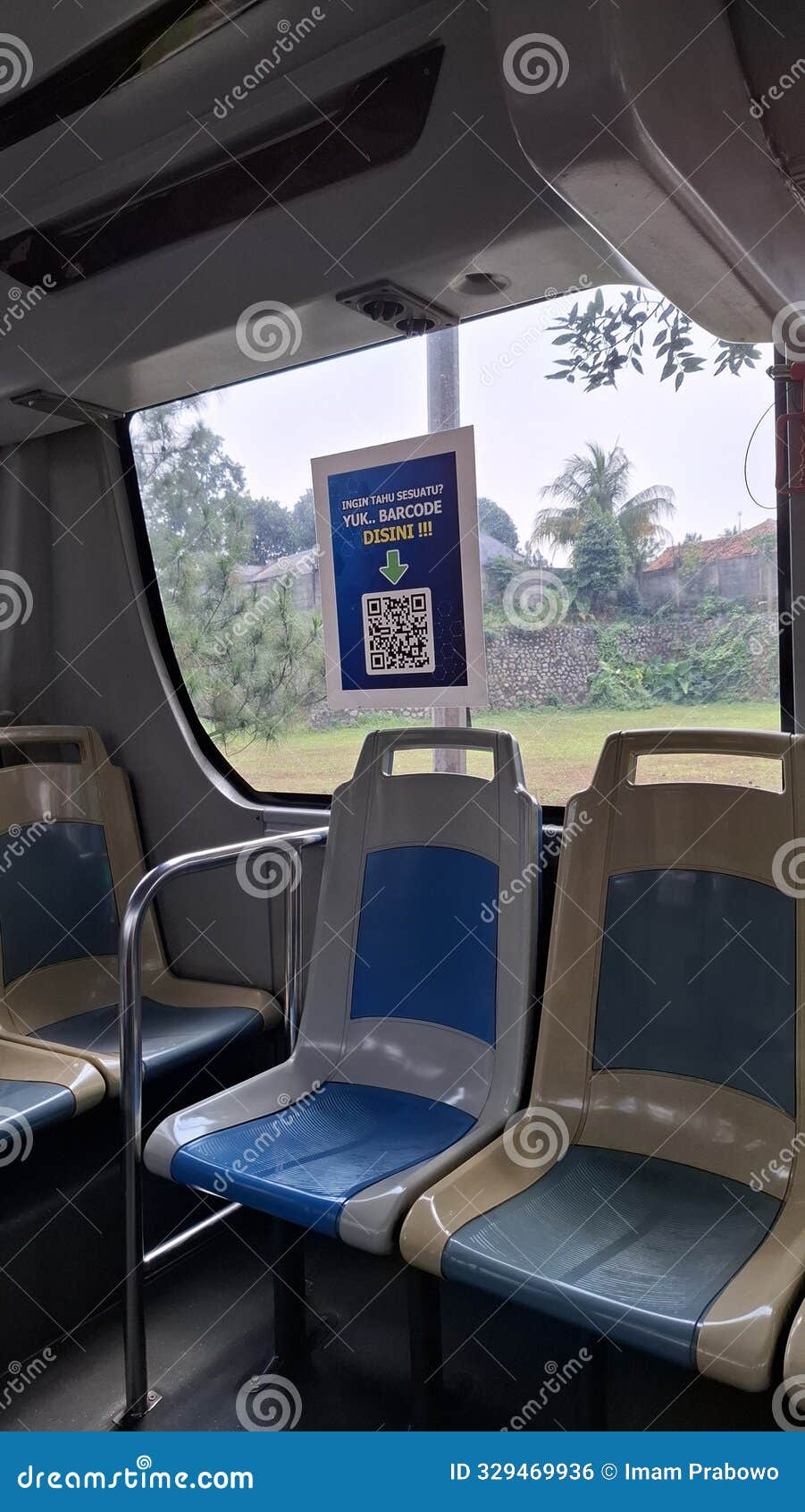 A Sign with QR Code Inside a Bus Offering Information for Passengers ...