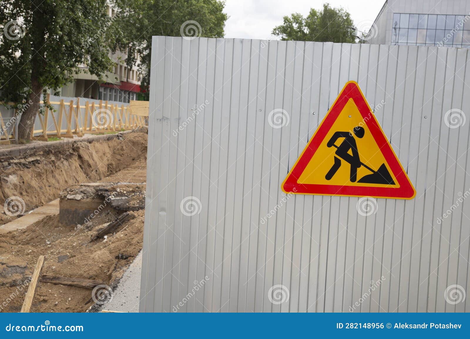 Sign Repair Work.Repair and Replacement of Pipes in the City Stock ...