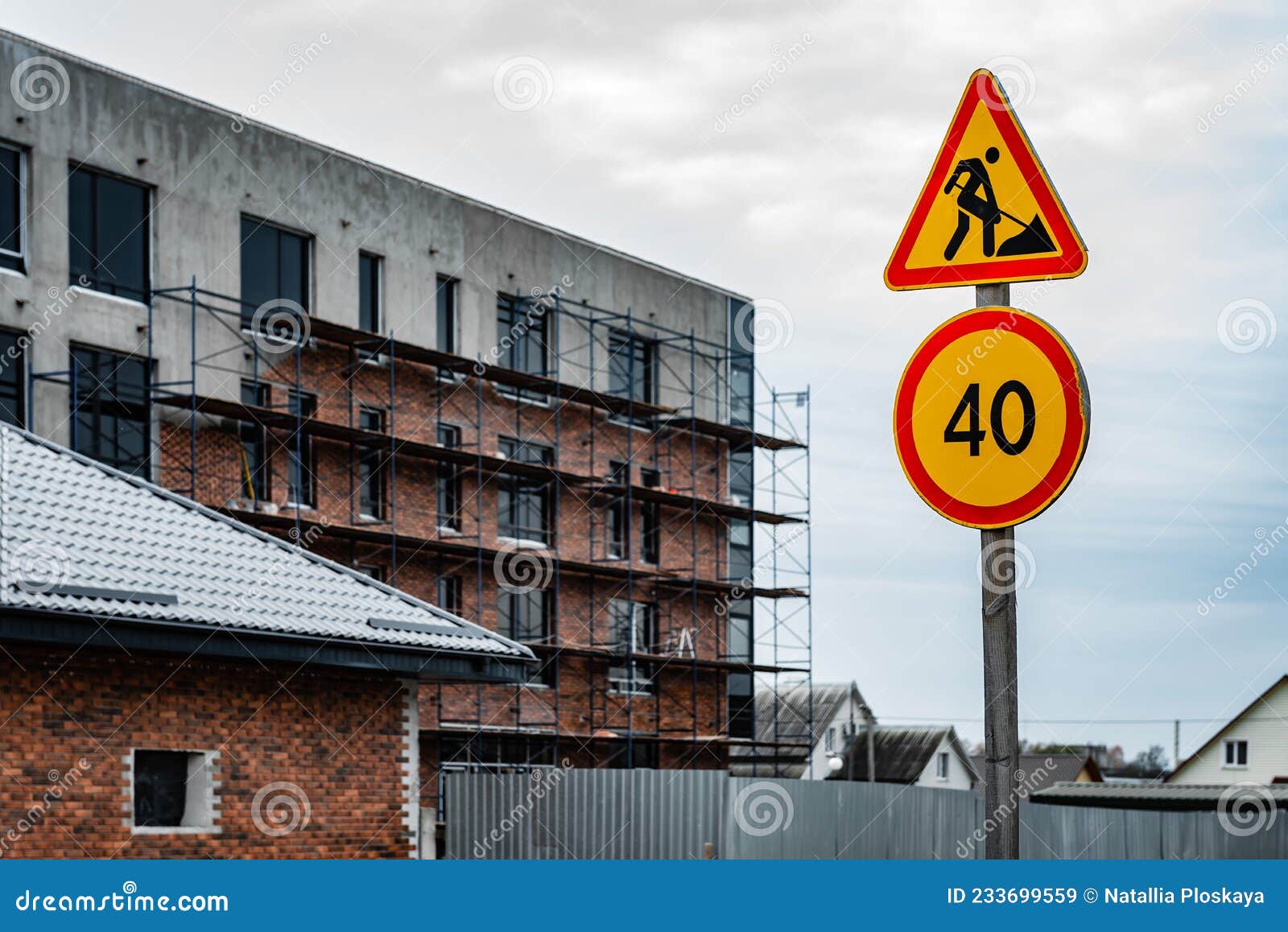 Sign `repair Work` and `speed Limit` on Background of Construction of a ...