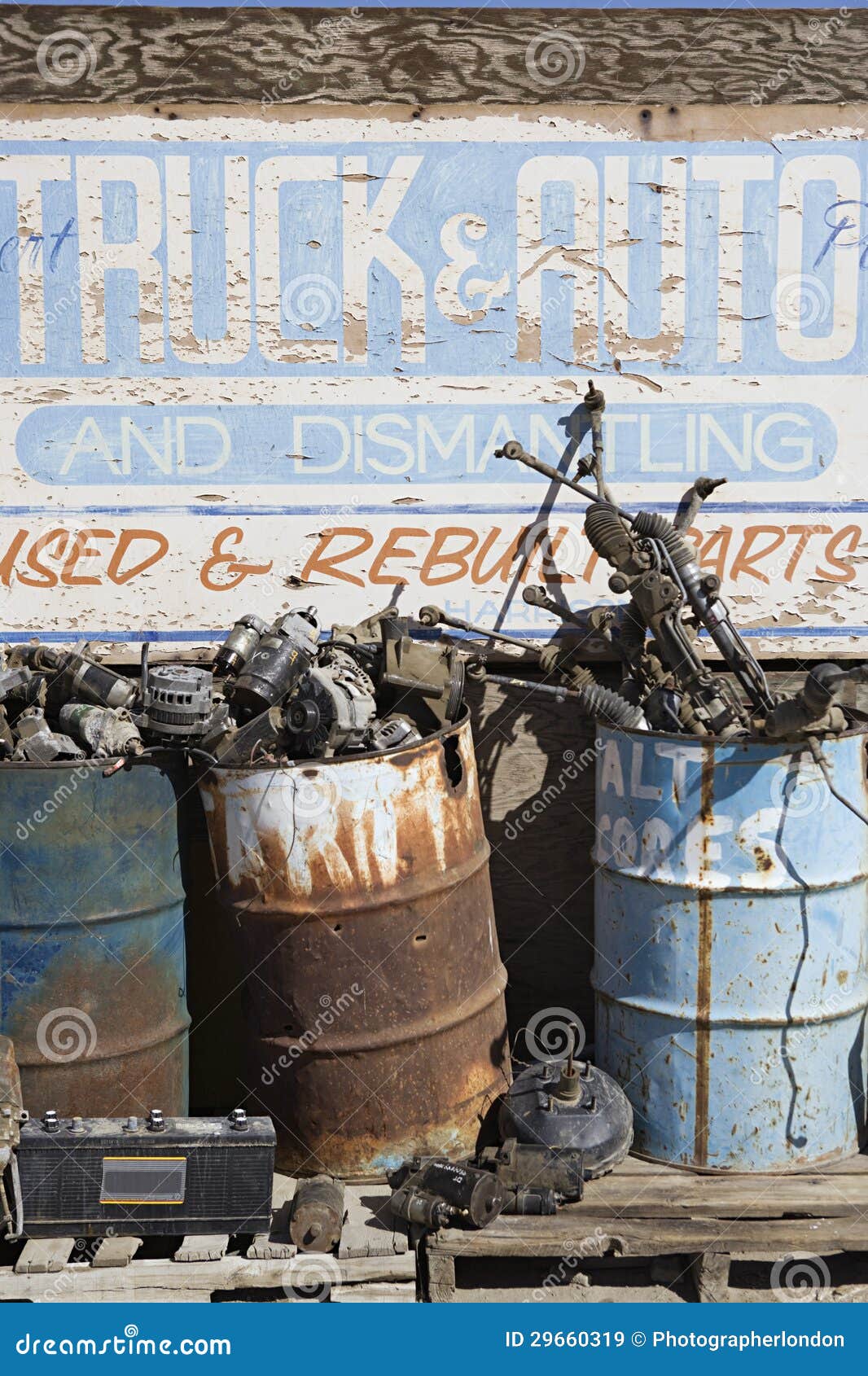 Sign and Rusty Barrels in Junkyard Stock Image - Image of wreck ...