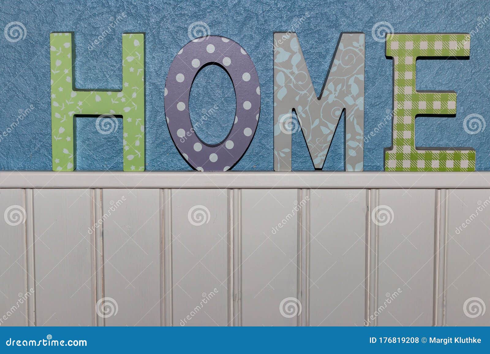 Sign Saying `Home` on a Blue and White Wall Stock Photo - Image of ...