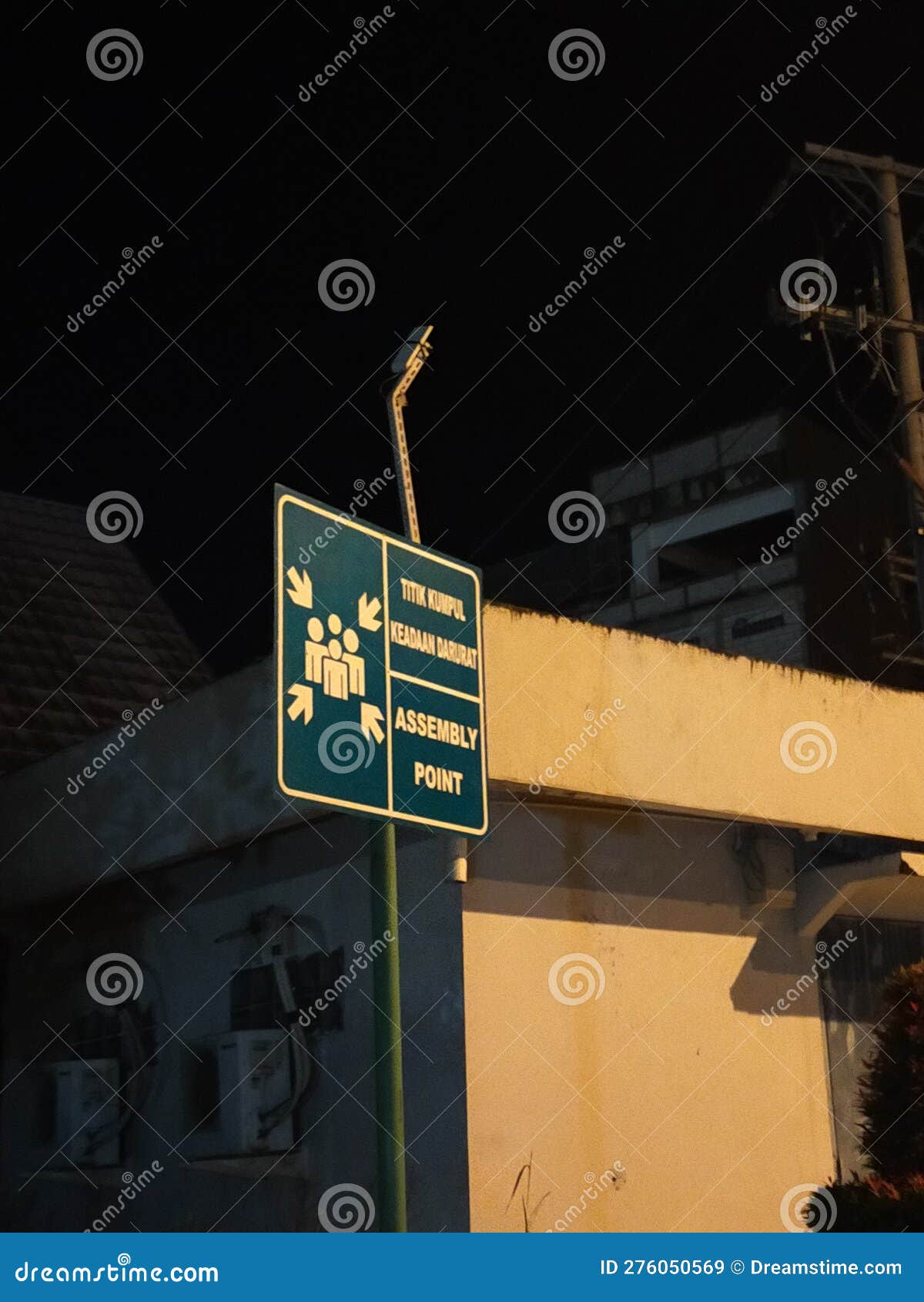 The Sign Says Gathering Point at Night with Little Light Stock Image ...