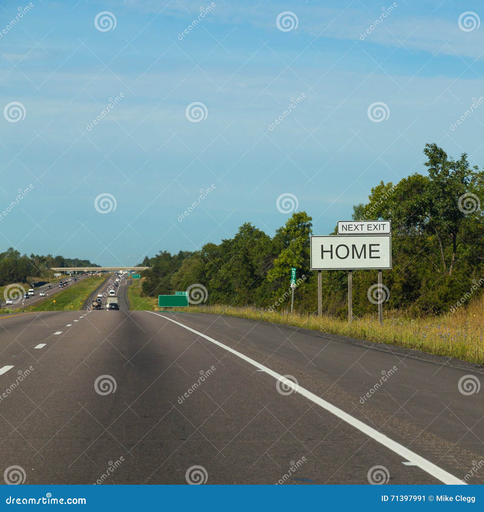 Sign at the Side of a Road with HOME NEXT EXIT on it Stock Image ...