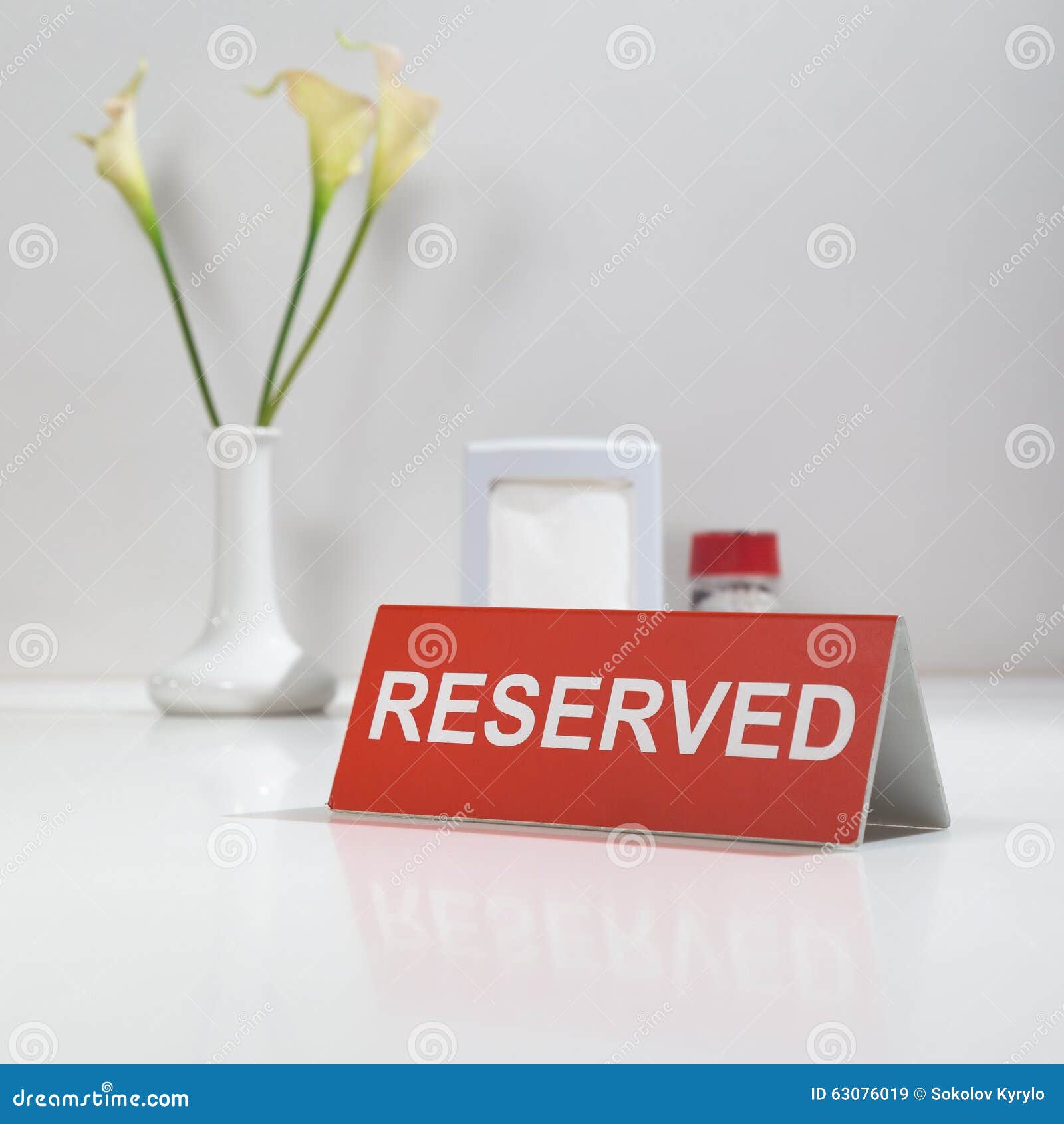 Sign on the table Reserved stock image. Image of preparation - 63076019