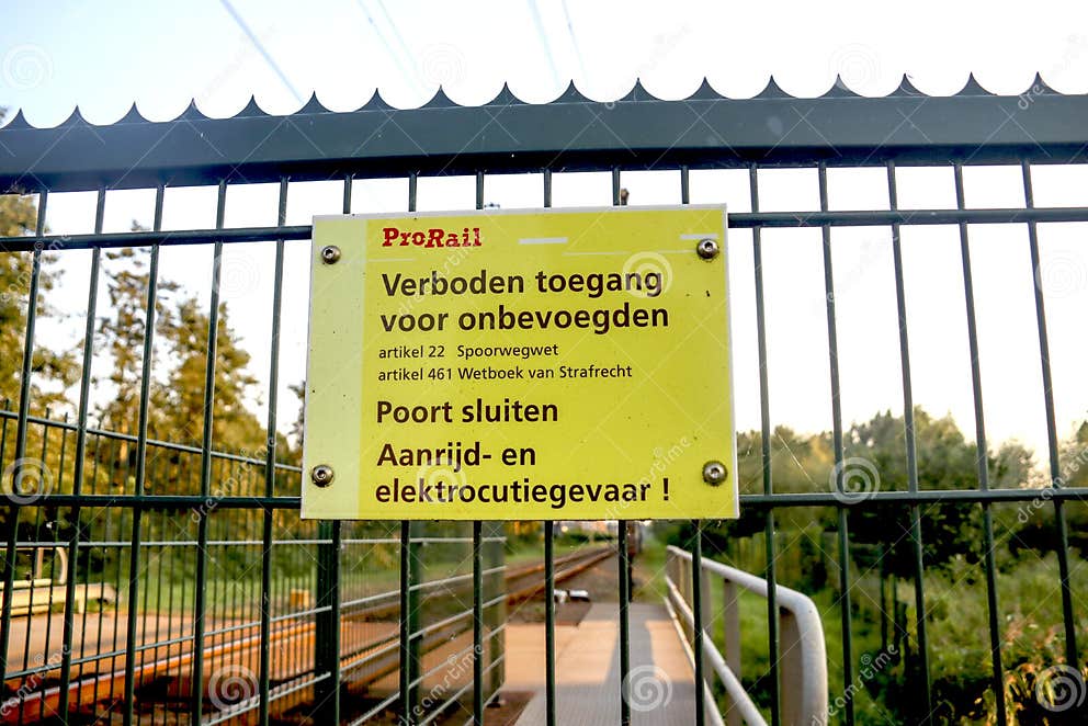 Sign To Warn of Collision and Electrocution on the Train Tracks ...