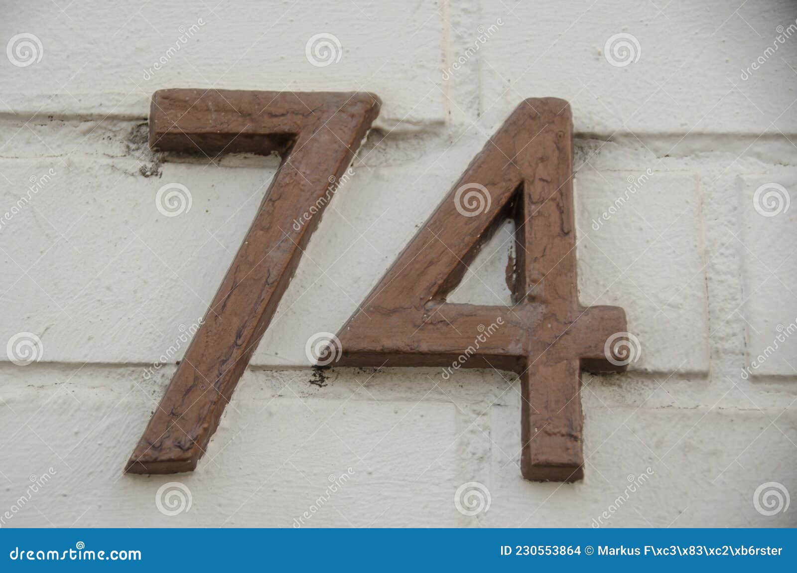 A Wall with the Number Seventy-four Stock Photo - Image of isolated ...