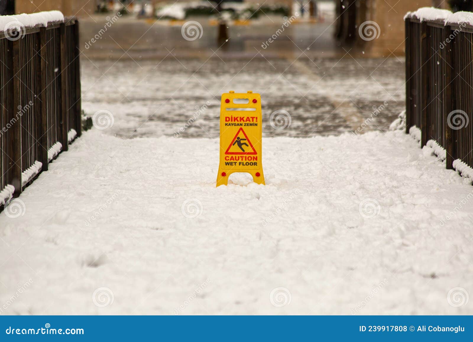 A Sign Warning of Slippery Ground on Snow Stock Photo - Image of safety ...