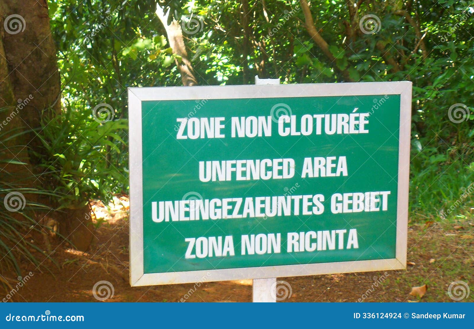 A Signage of Restricted Unfenced Area in Forest Stock Photo - Image of ...