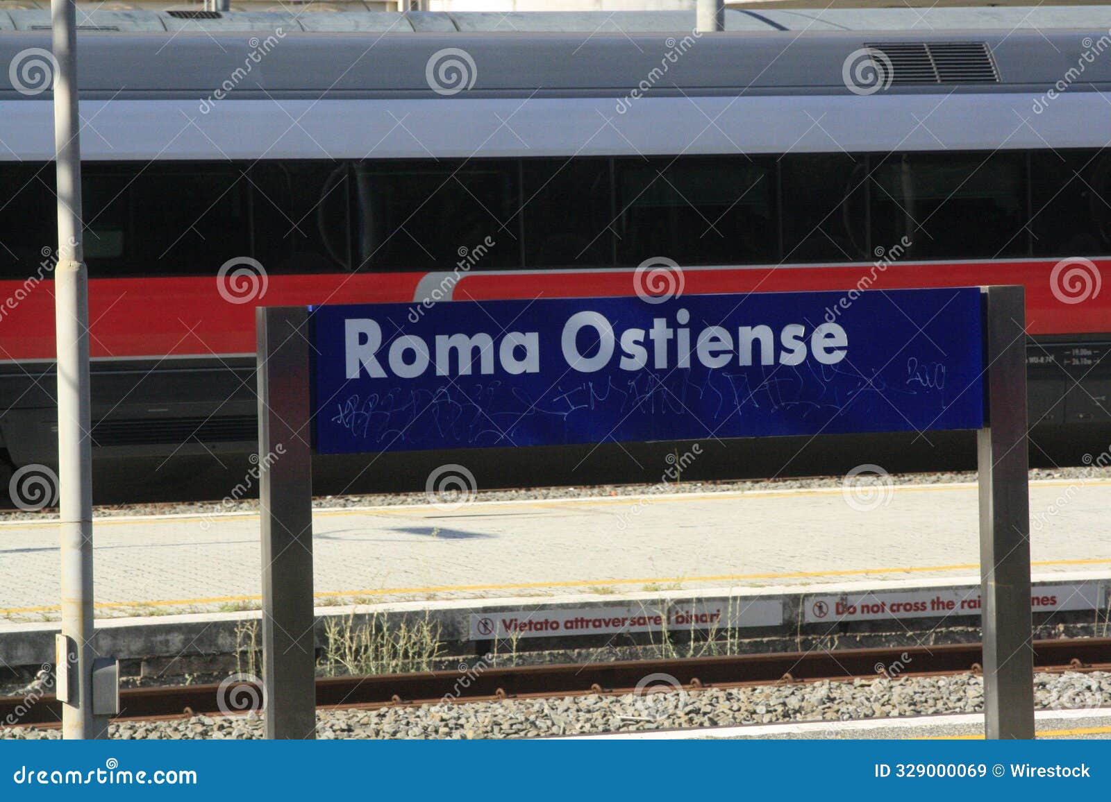 Signboard of Roma Ostiense Railway Station with a Train in the ...