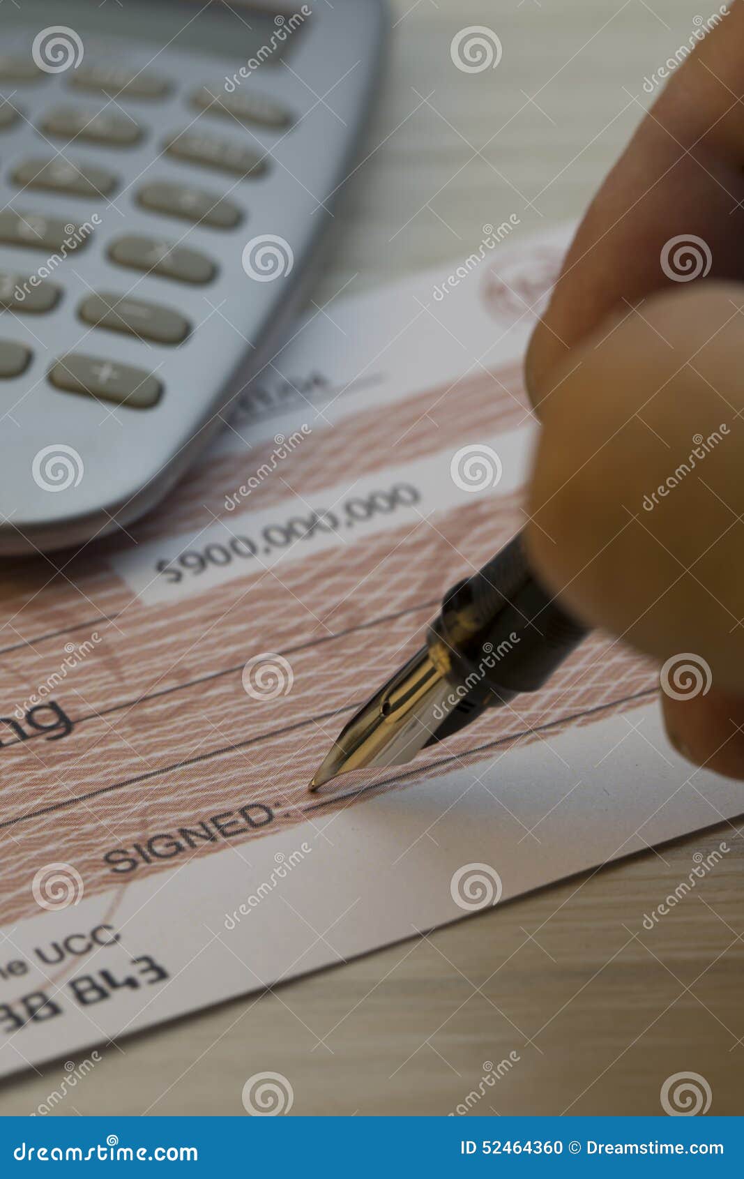Signing a Check stock photo. Image of buying, finance - 52464360