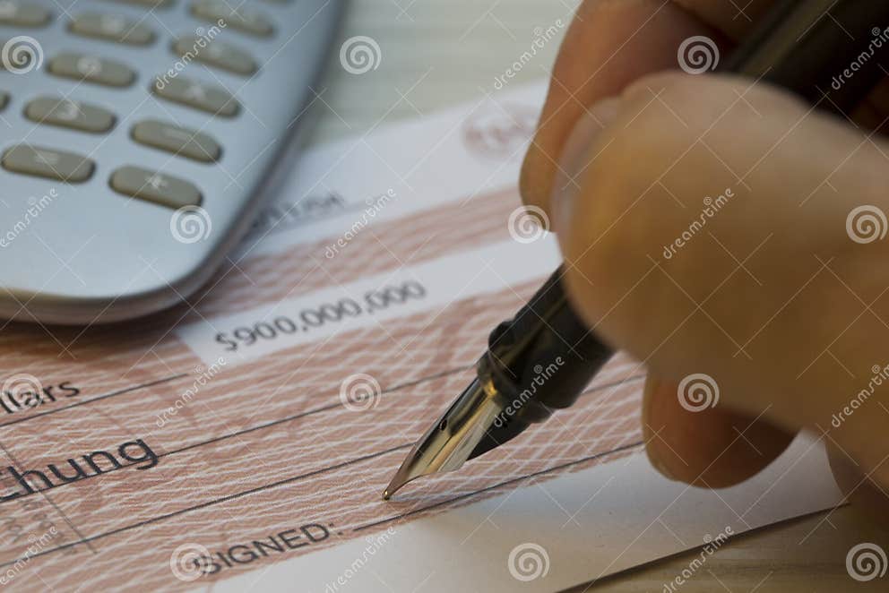 Signing a Check stock photo. Image of buying, sign, handwriting - 52464748