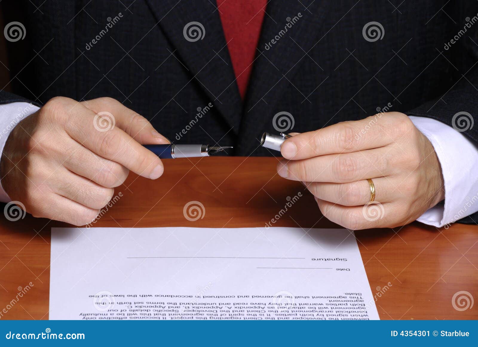 Signing a contract stock image. Image of writing, document - 4354301
