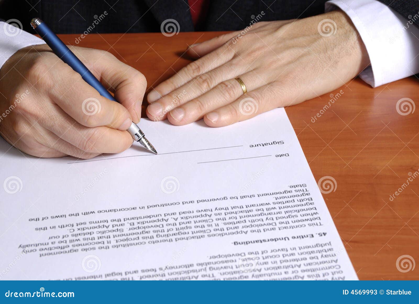 Signing a contract stock image. Image of closeup, contract - 4569993