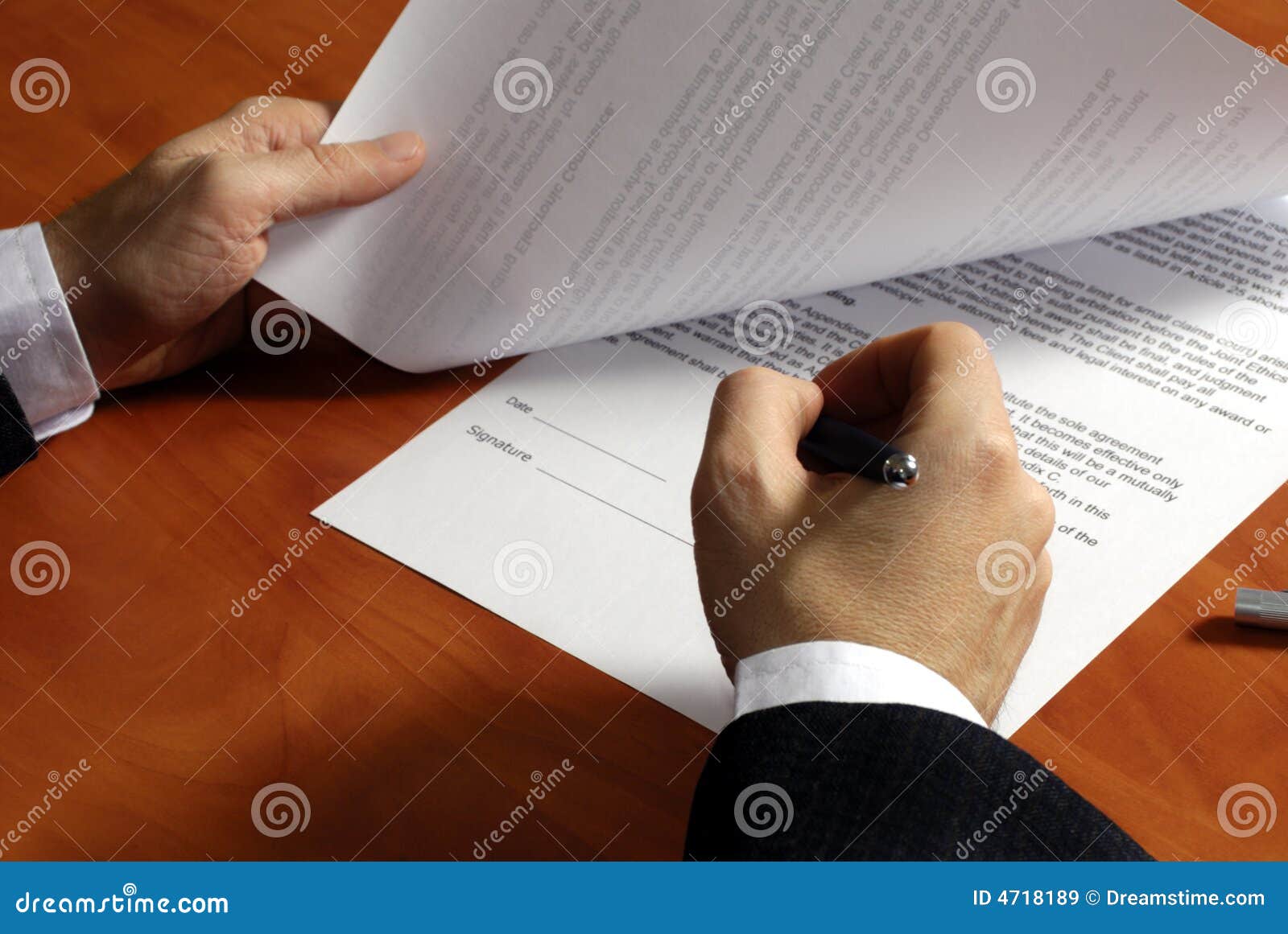 Signing a contract stock image. Image of businessman, agreement - 4718189