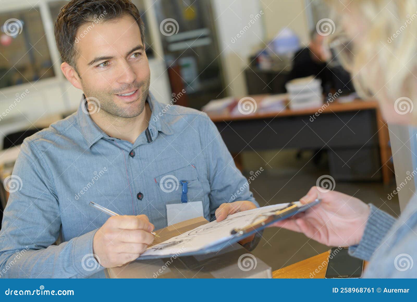 He signing delivery stock image. Image of profession - 258968761