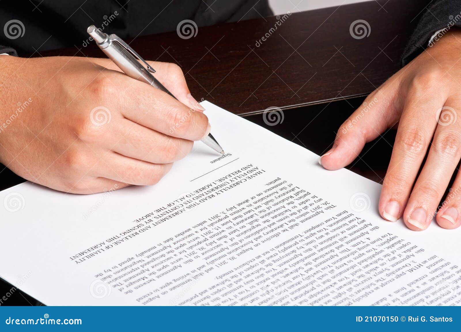 Signing a Document stock photo. Image of businessperson - 21070150