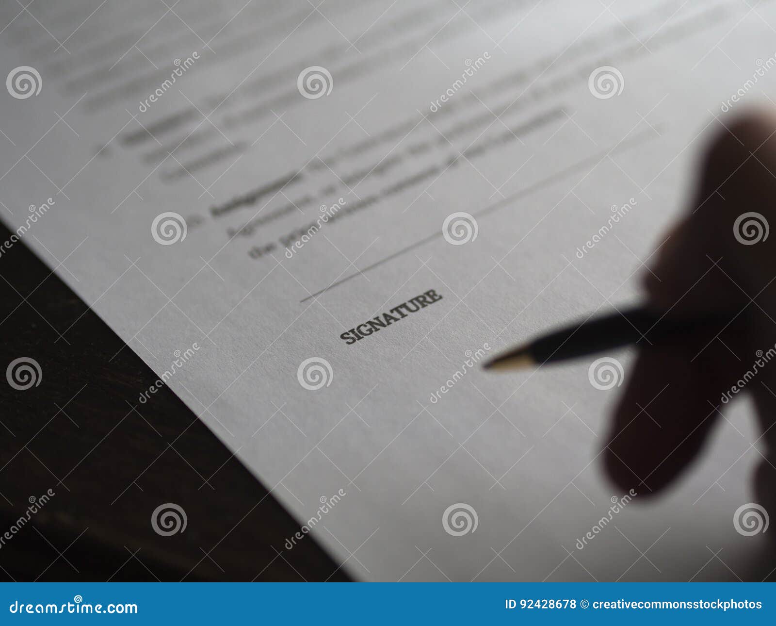 Signing Paperwork Picture. Image: 92428678