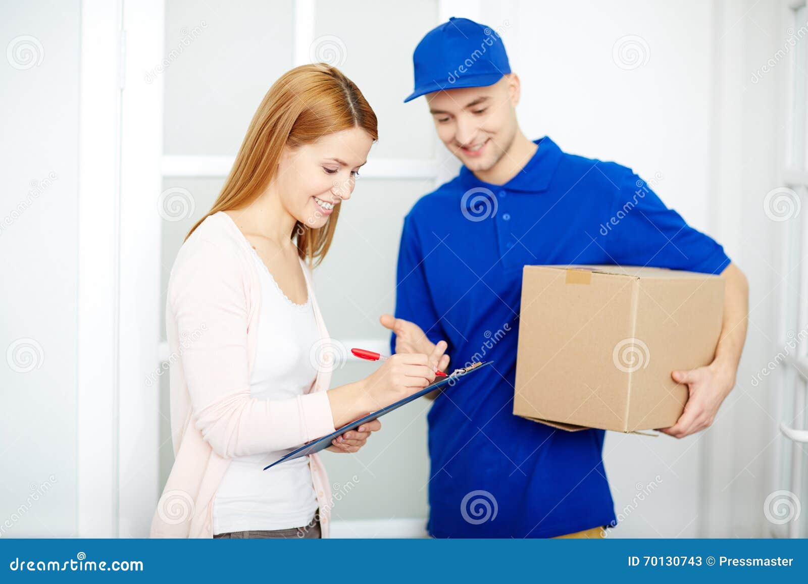 Signing for parcel receive stock image. Image of handsome - 70130743