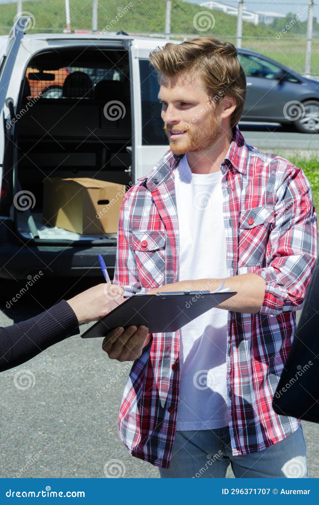 Signing Receipt for Delivering Parcel from Male Courier Stock Image ...