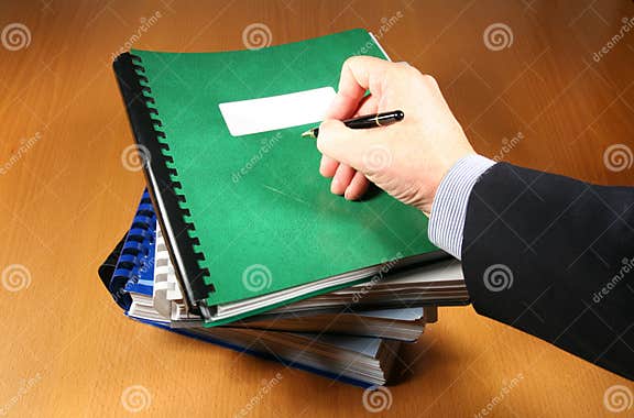 Signing a Report stock image. Image of write, office, business - 1394781