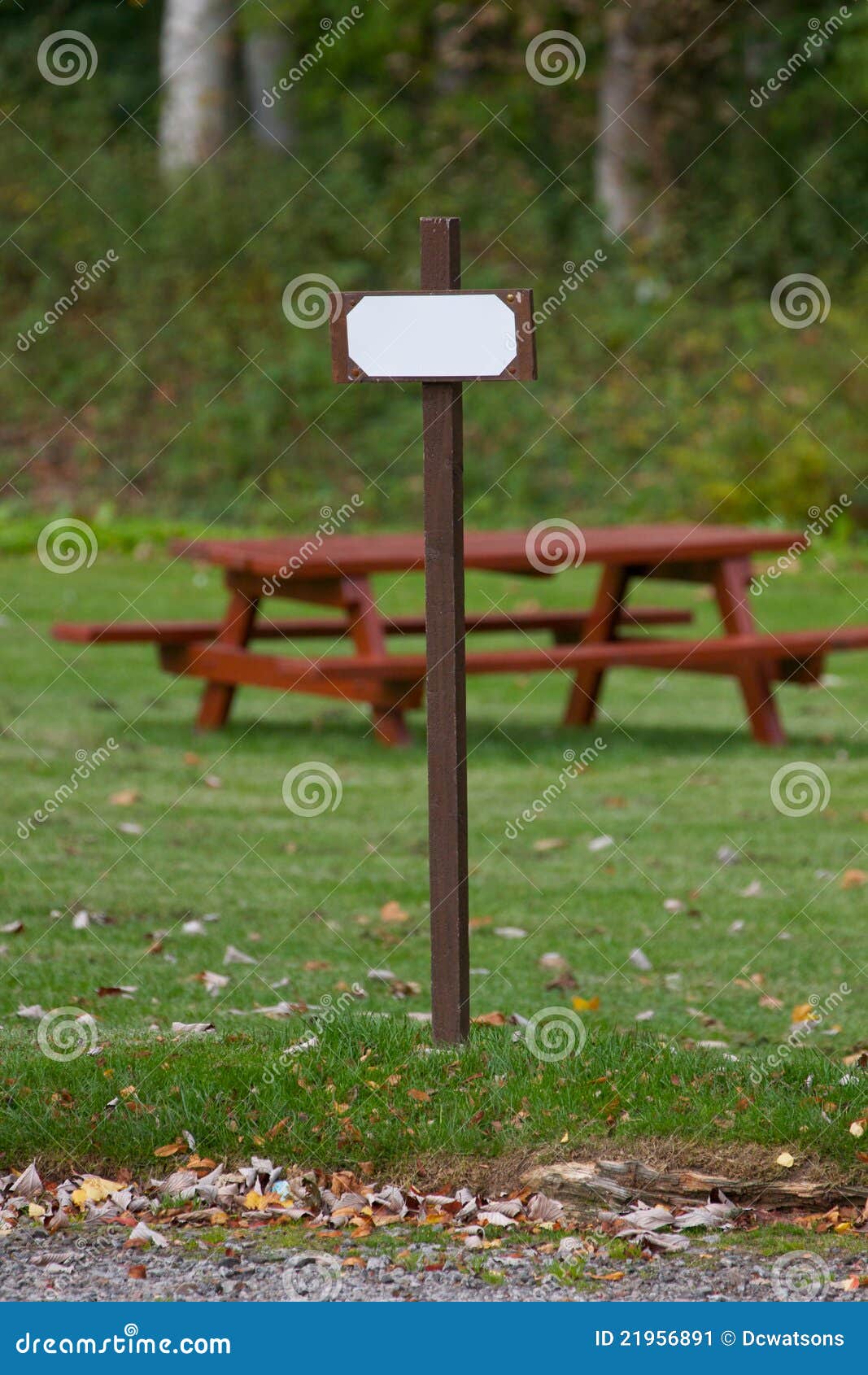 Signpost beside park bench stock image. Image of park - 21956891