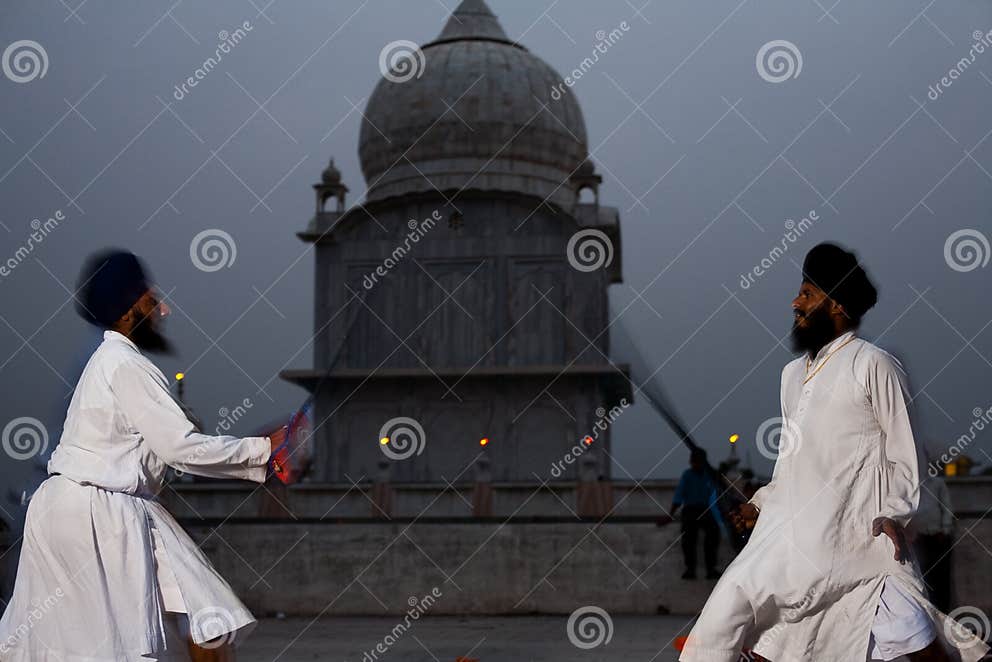 Sikh Men Duel Swords editorial stock image. Image of guys - 17273119