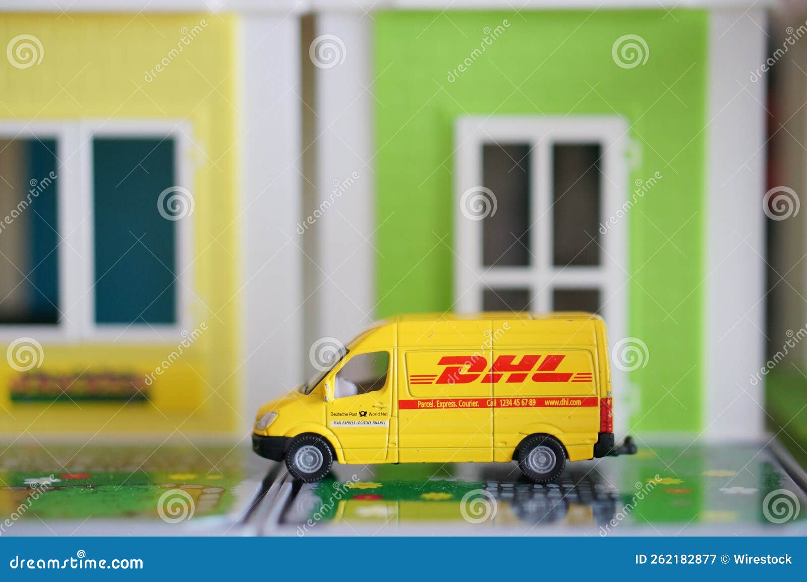 Siku DHL toy model van editorial photography. Image of side - 262182877