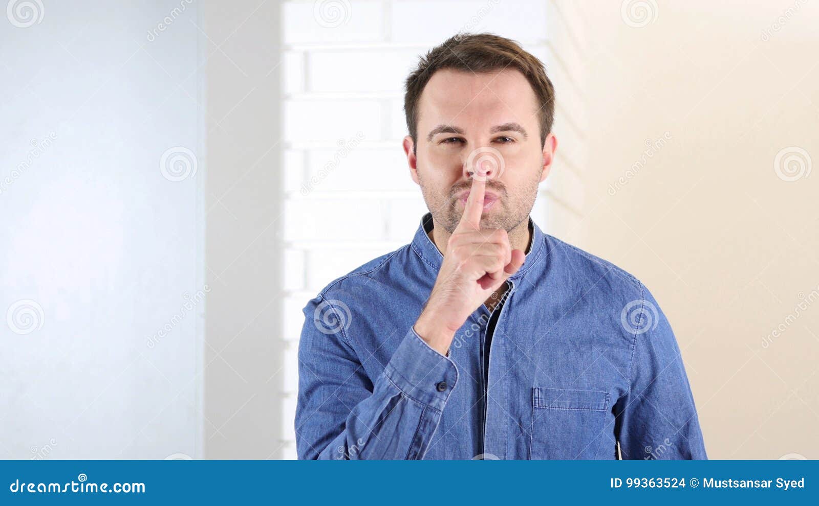 Silence Gesture by Middle Aged Man Stock Photo - Image of business ...
