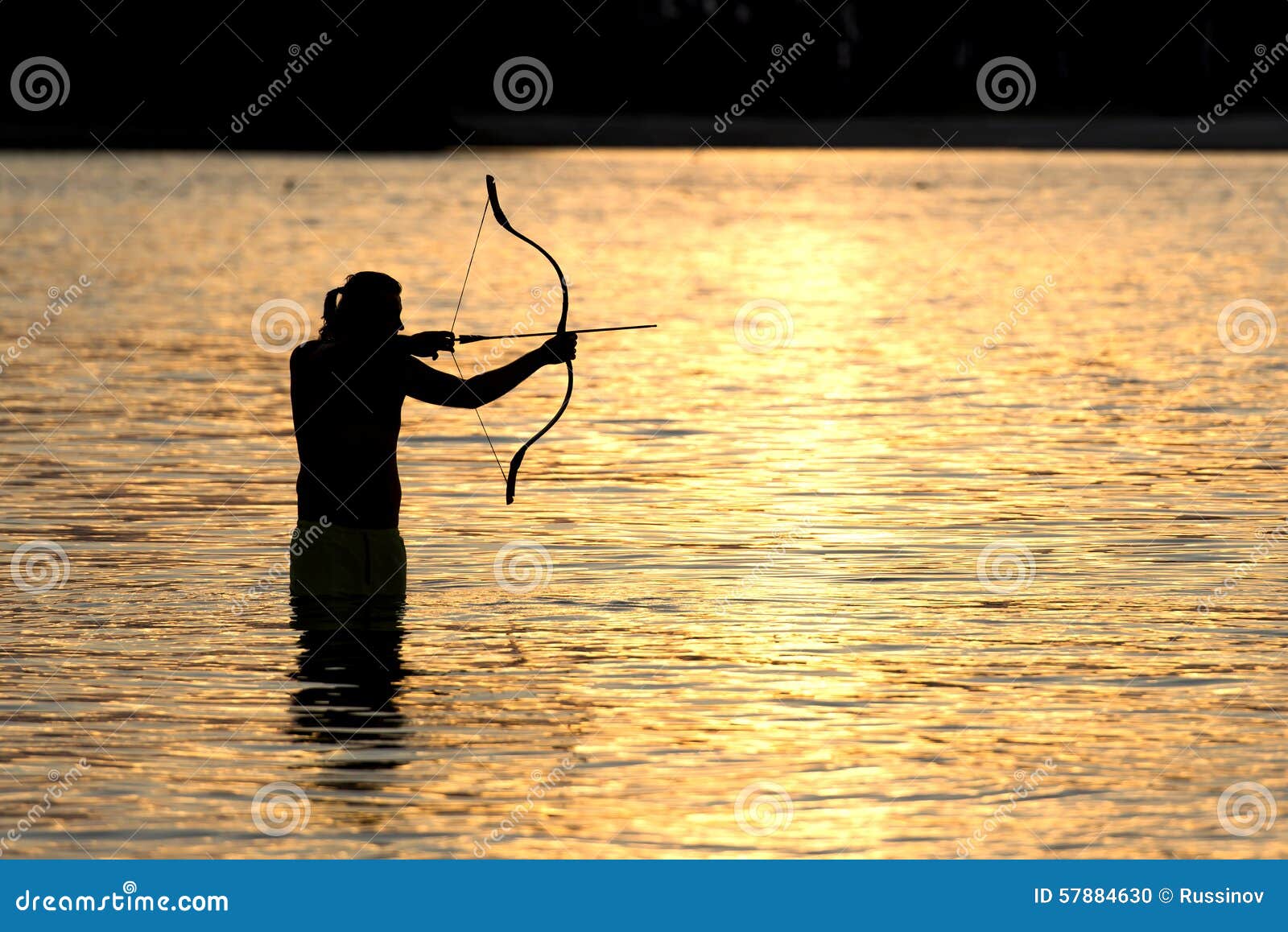 Silhouette Archery Shoots a Bow at a Target in Sunset Sky Stock Photo ...