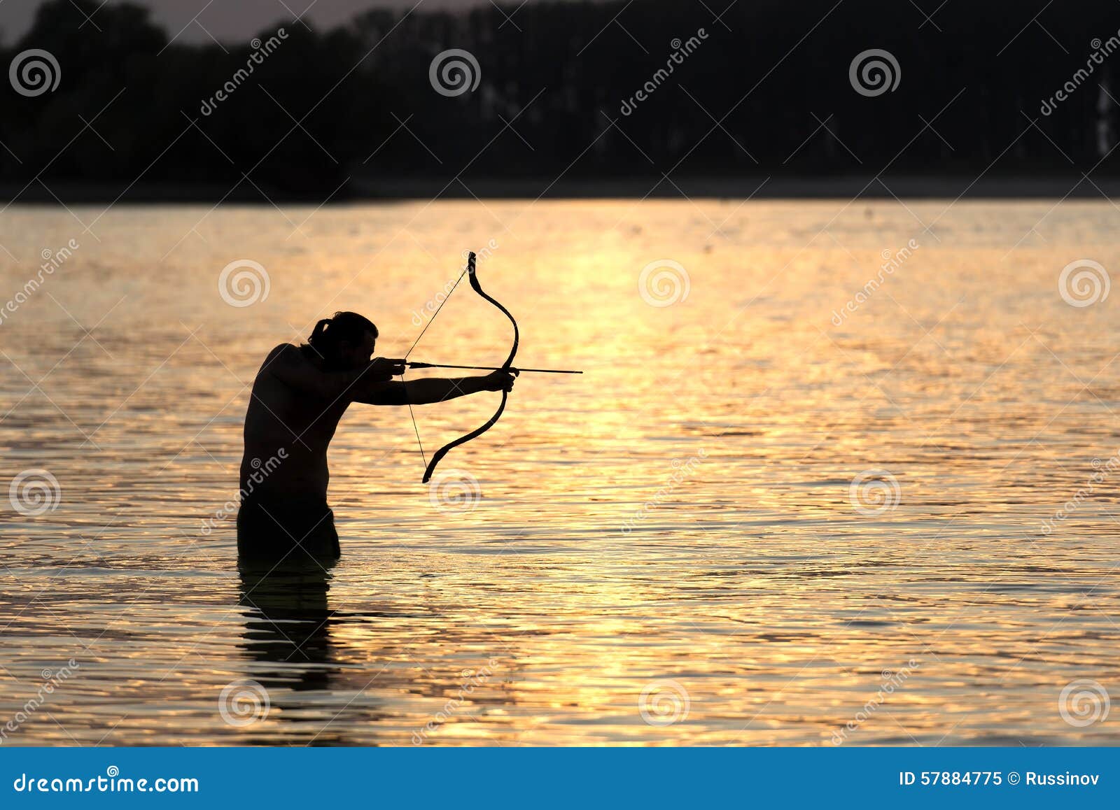 Silhouette Archery Shoots a Bow at a Target in Sunset Sky Stock Image ...