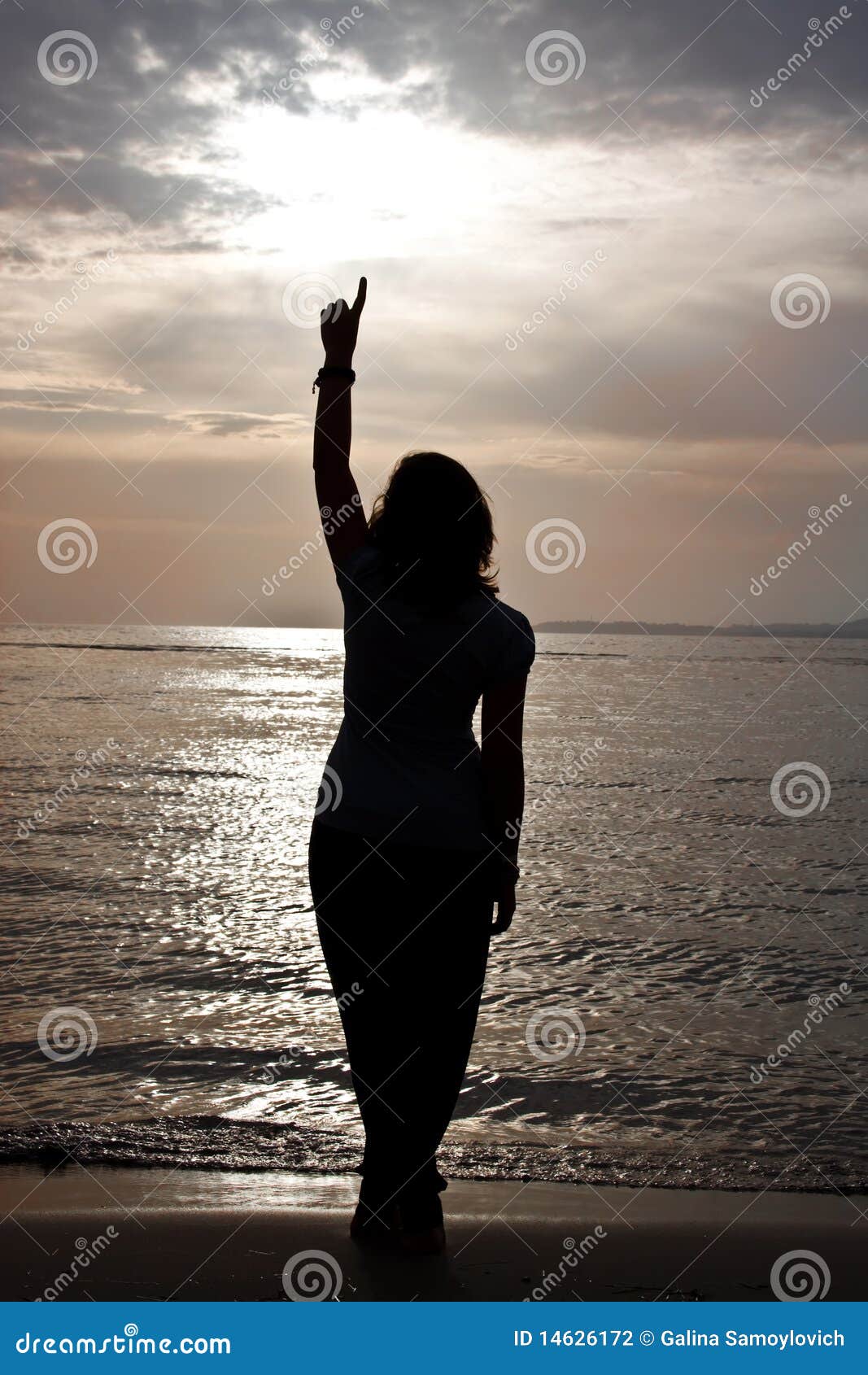 A Silhouette of a Beautiful Girl Against the Sunset Stock Photo - Image ...
