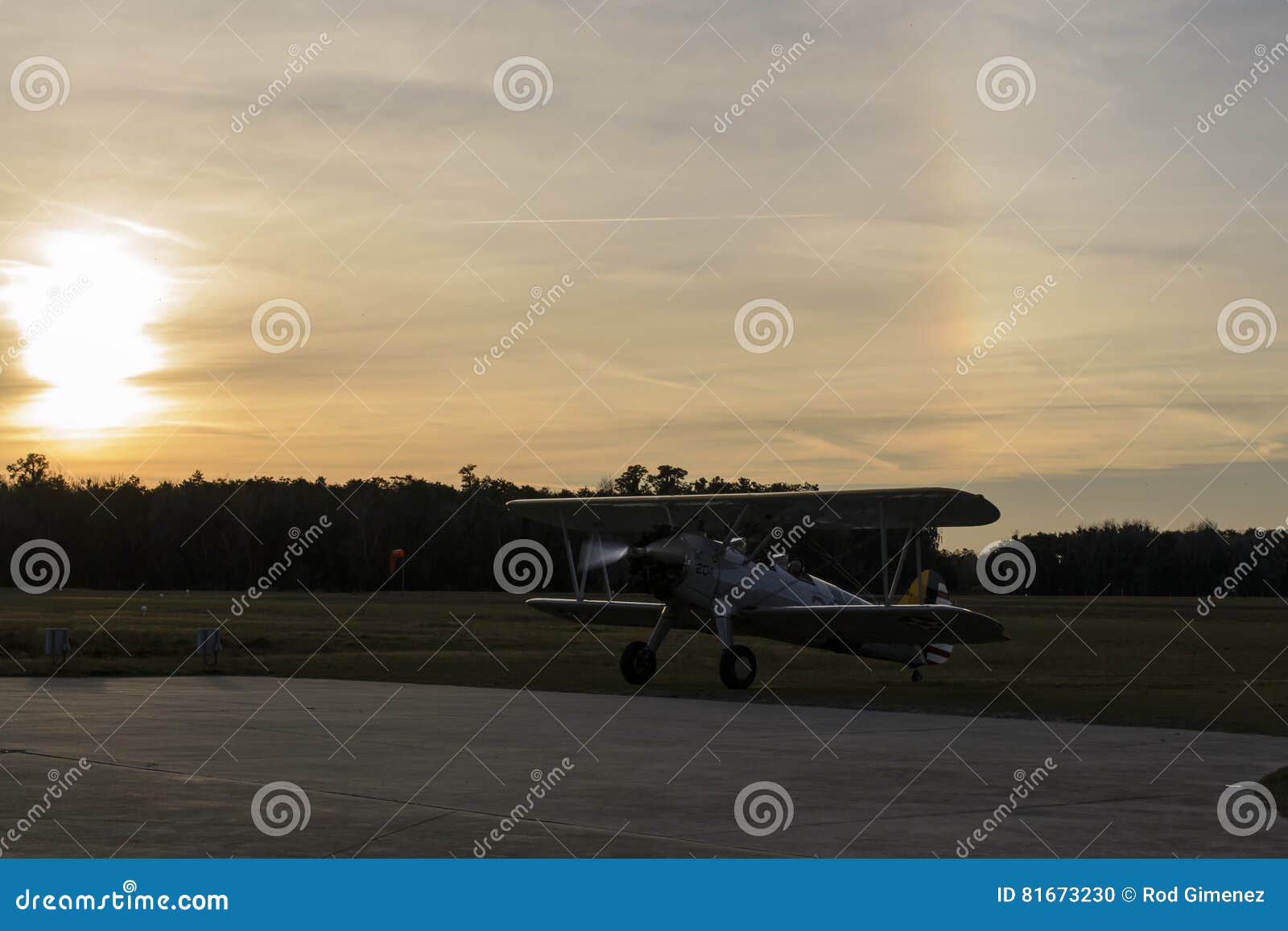 Silhouette of Biplane about To Take Off during Sunset Stock Photo ...