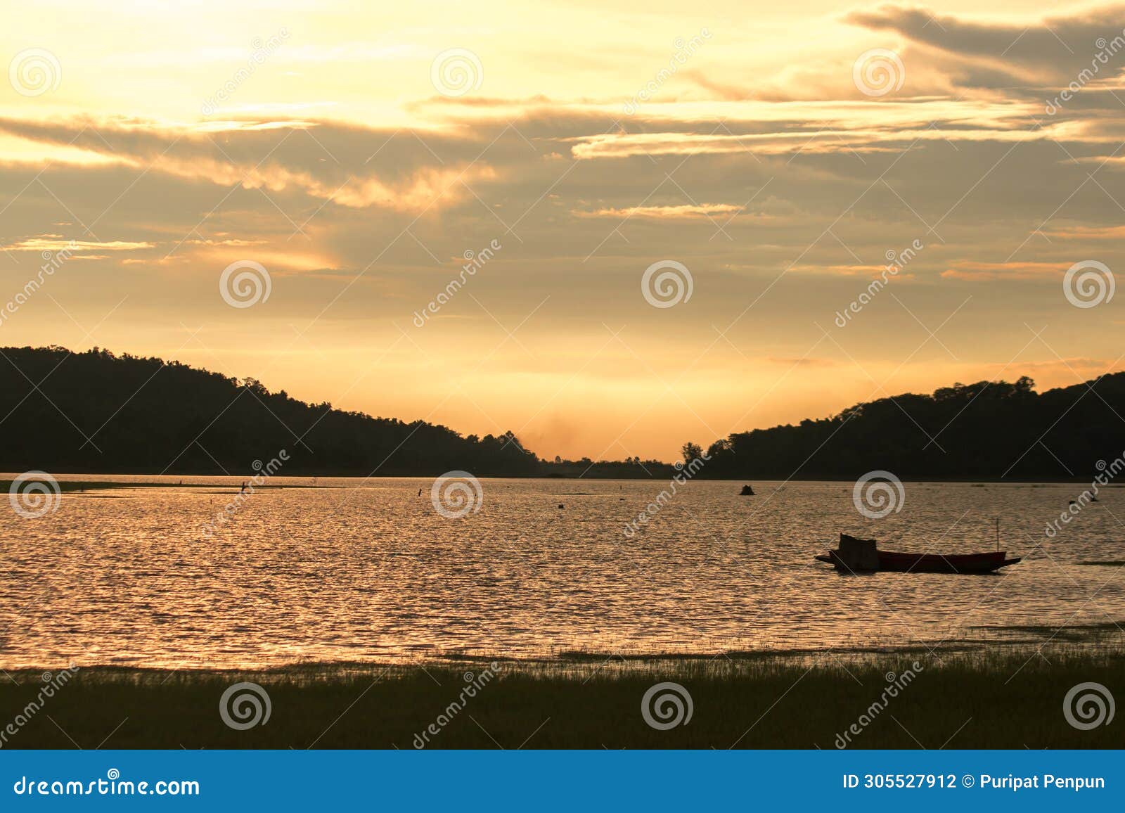 Boat in the Water and the Evening Atmosphere Stock Photo - Image of ...