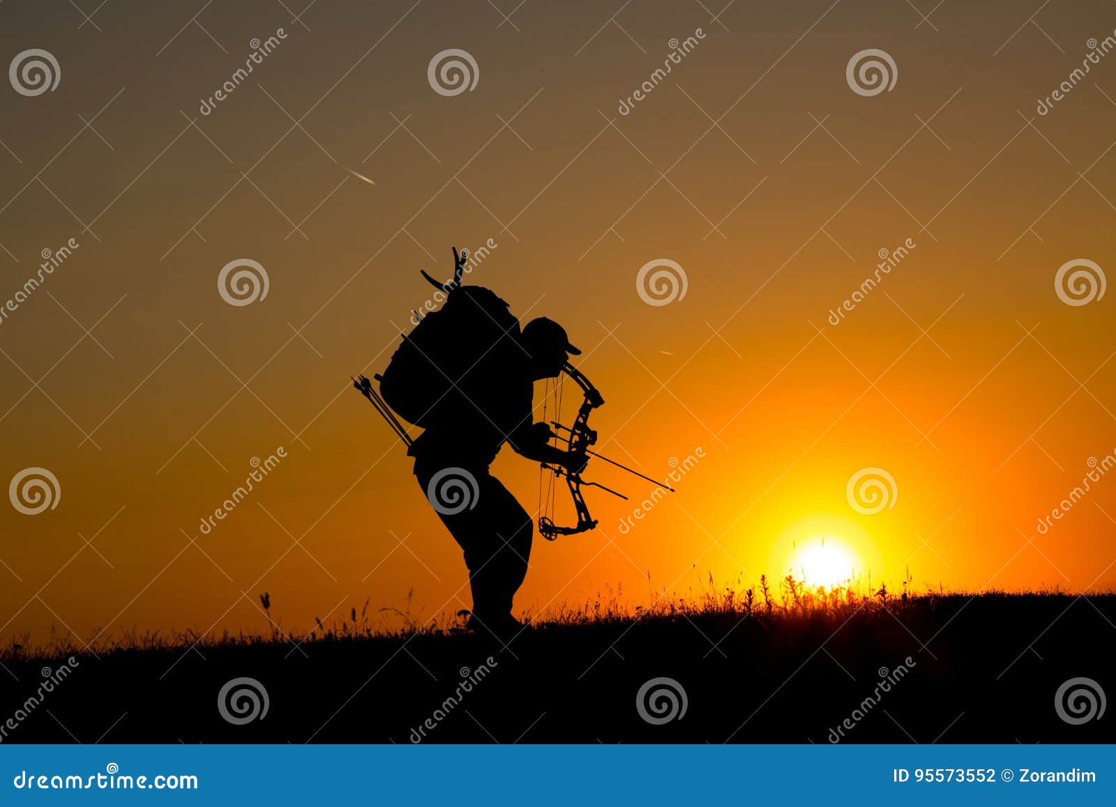 Silhouette of a bow hunter stock photo. Image of aiming - 95573552