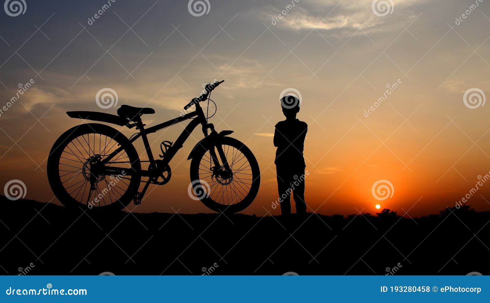 Silhouette of Boy and Cycle at Sunset Editorial Stock Photo - Image of ...