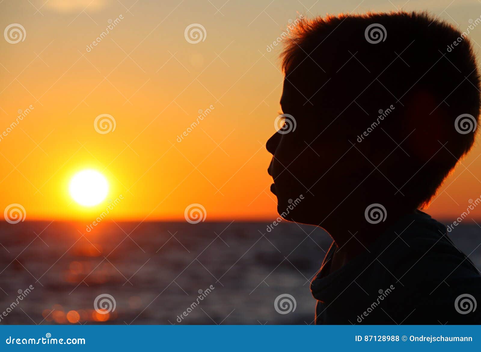 Silhouette of the Boy Head during the Sunset Stock Photo - Image of ...
