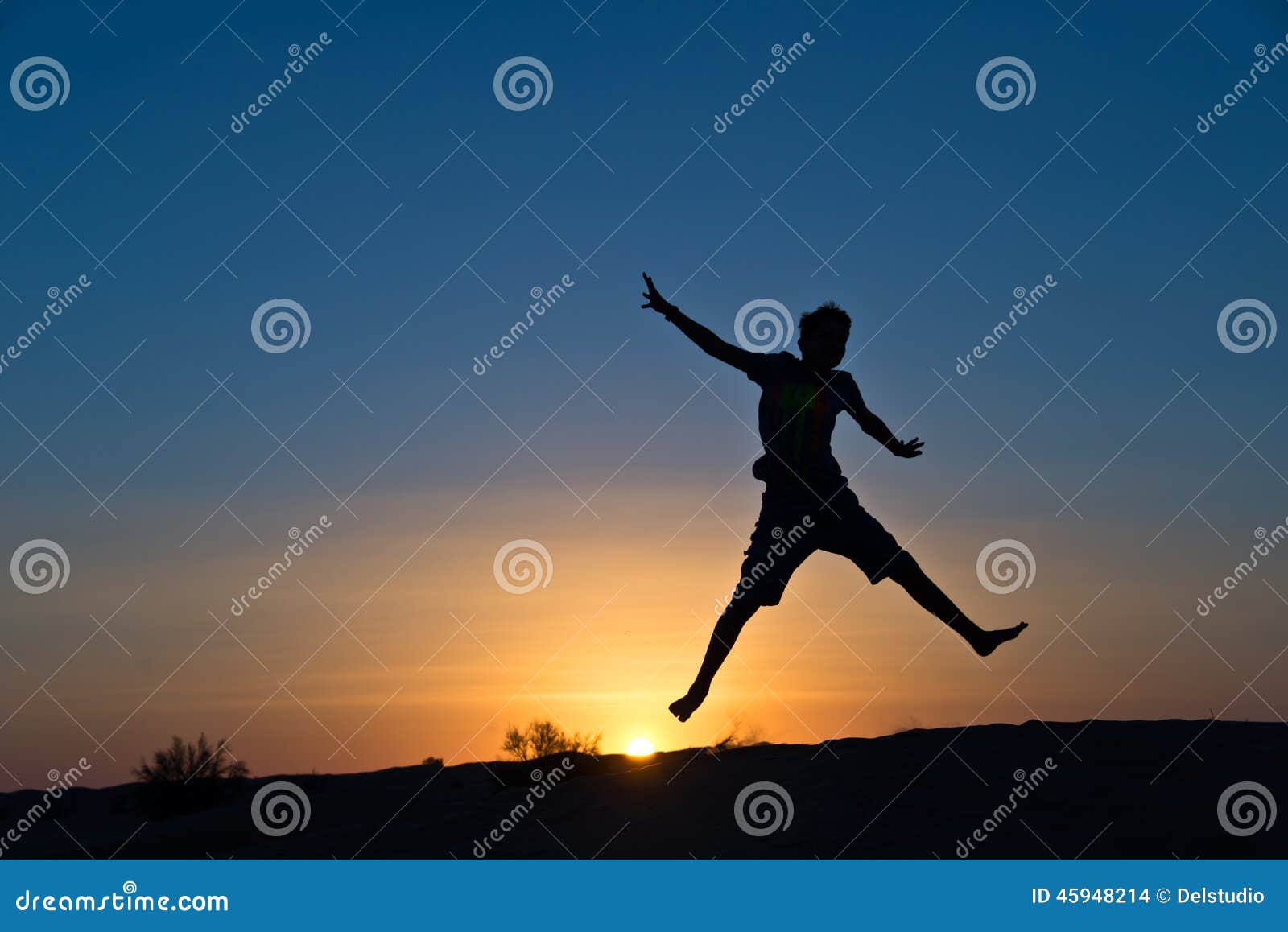 Silhouette of a Boy Jumping Stock Photo - Image of happiness, optimism ...