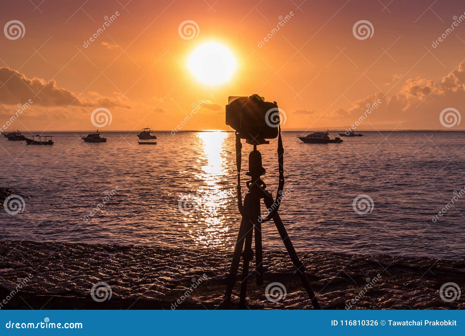 Silhouette of Camera on Tripod Shooting Sea with Sunset Stock Photo ...