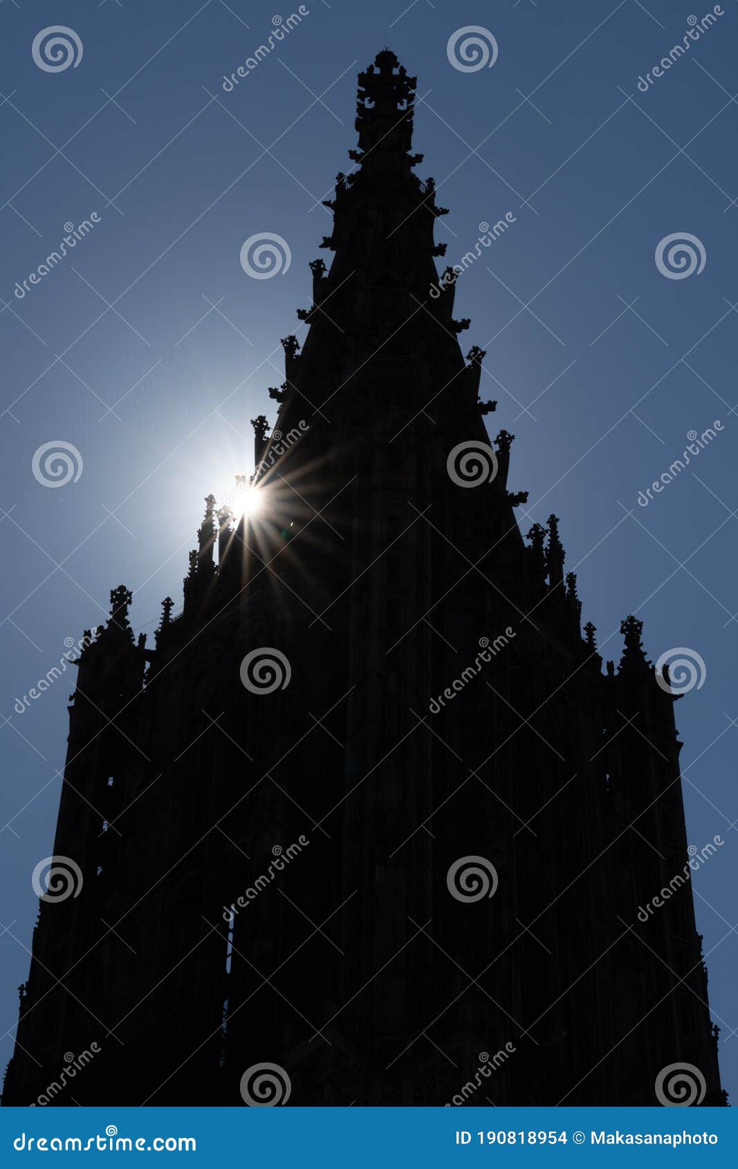 Silhouette of the Cathedral Spire of the Minster in Ulm with a Sun Star ...