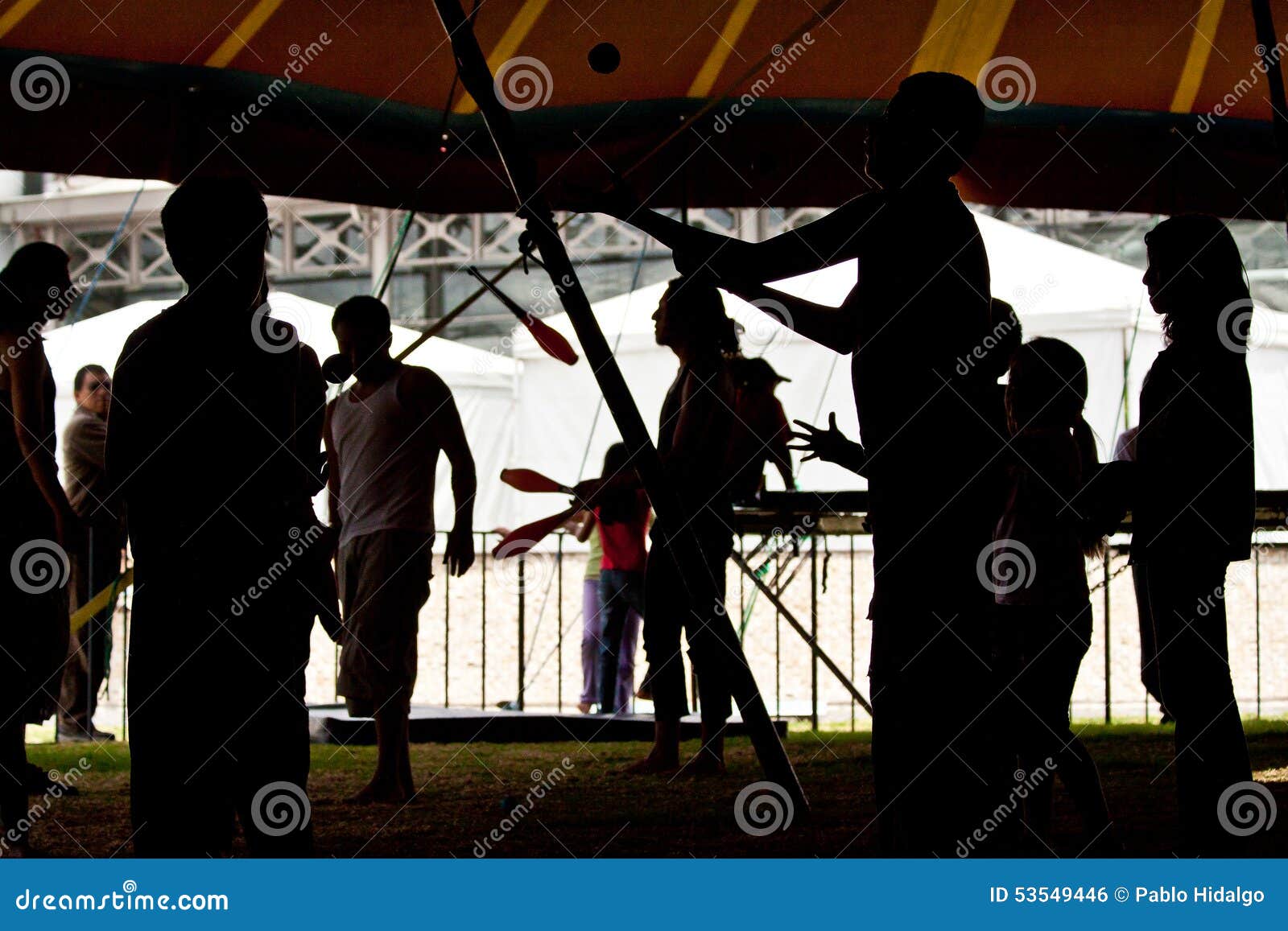 Silhouette Of Circus Artist On The Aerial Straps On Blue Sky Background ...