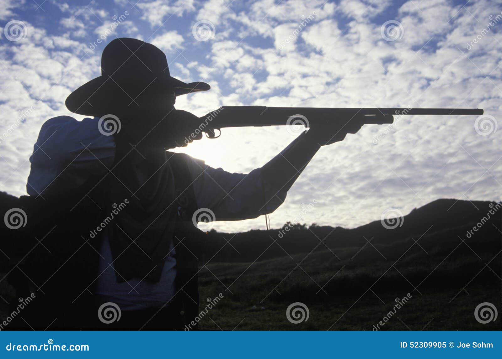 Cowboy Aiming Revolver Knife In Hand Royalty-Free Stock Photo ...