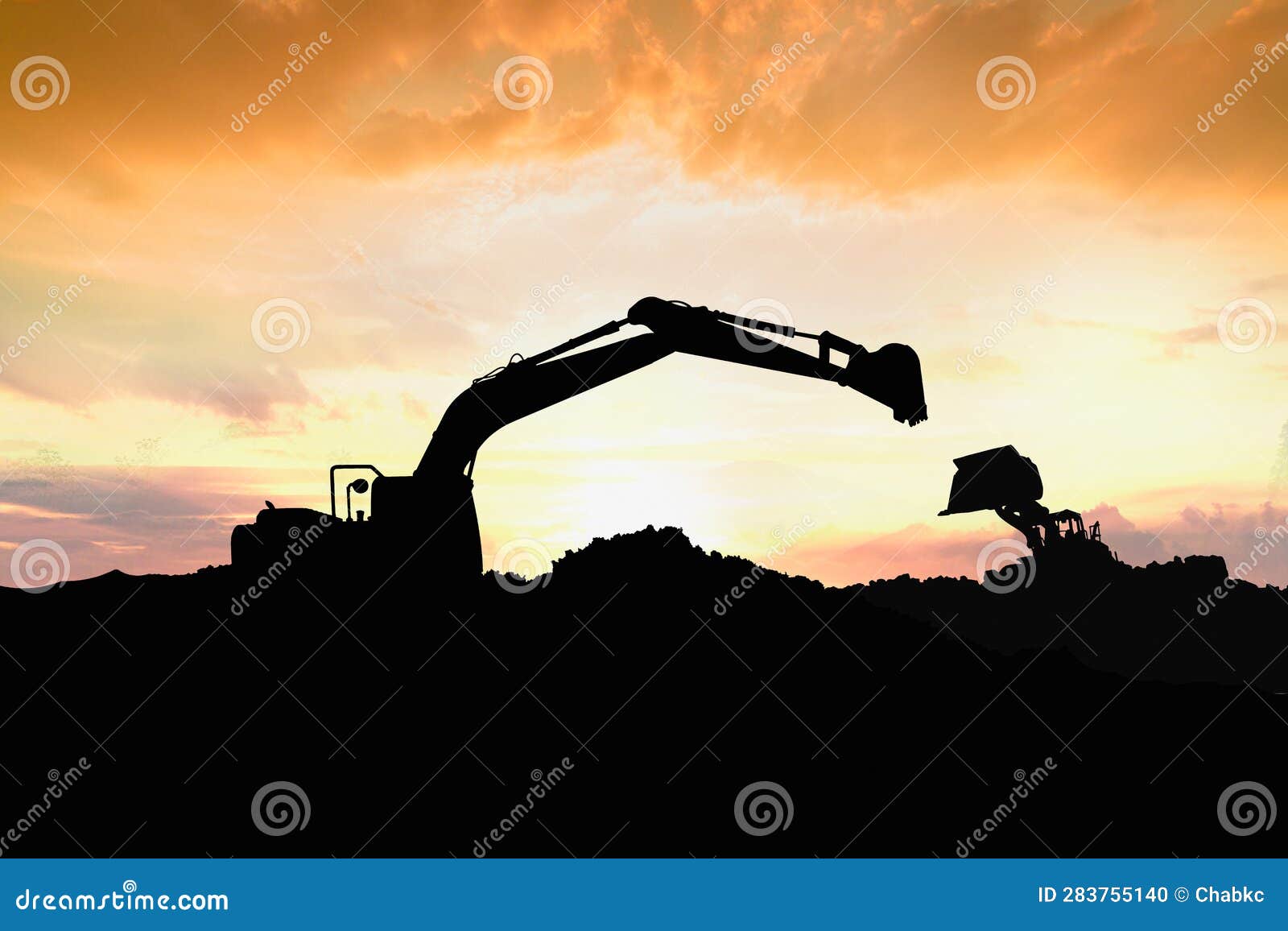 Silhouette Crawler Excavator and Wheel Loader are Digging the Soil in ...