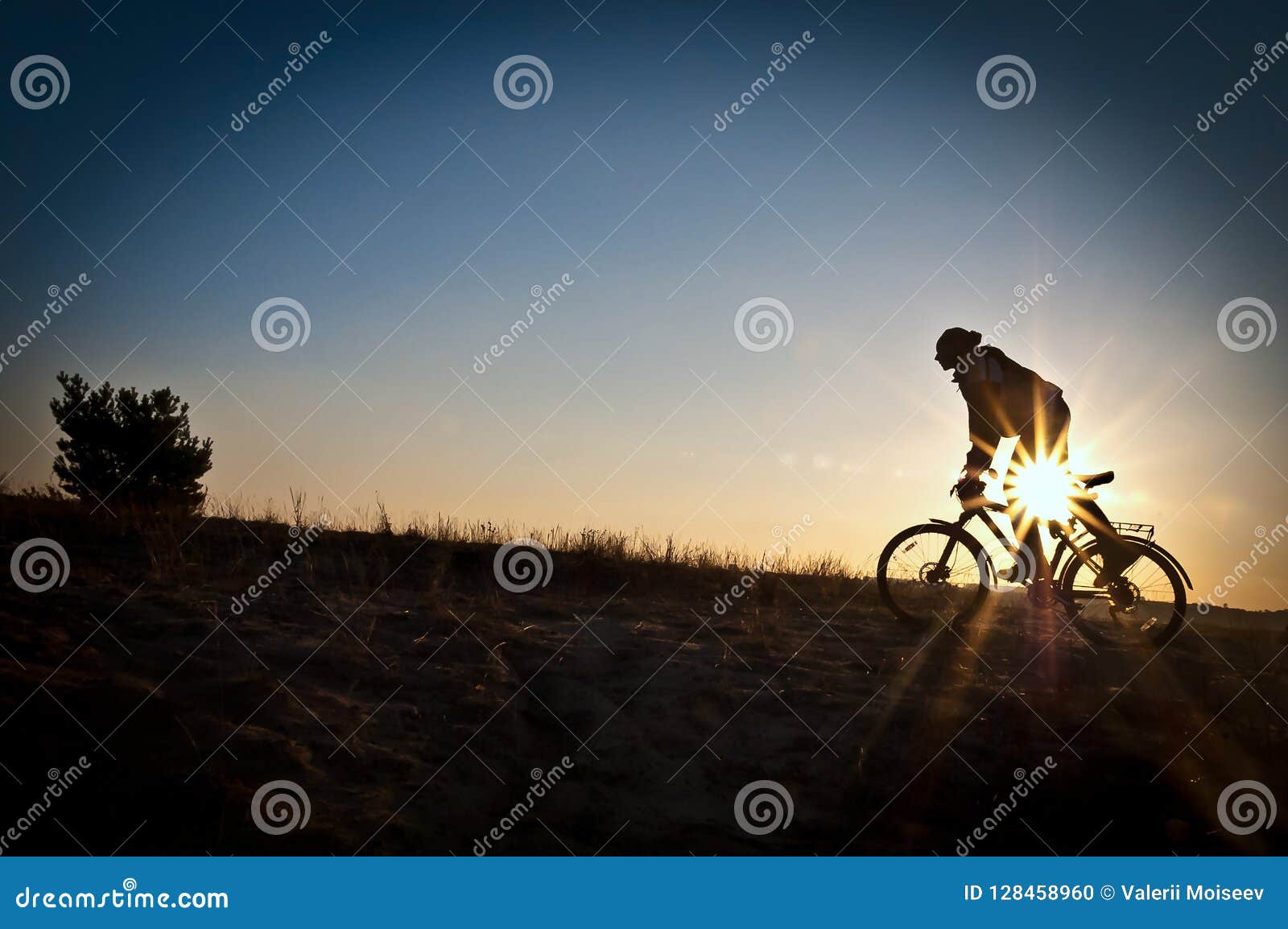 Silhouette of the Cyclist Speed Riding on Sunset Stock Photo - Image of ...