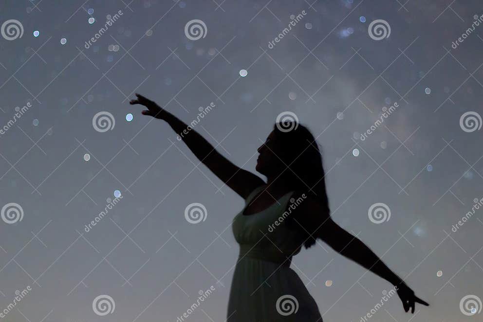 Silhouette Of A Dancing Woman Pointing In Night Sky Woman Silhouette