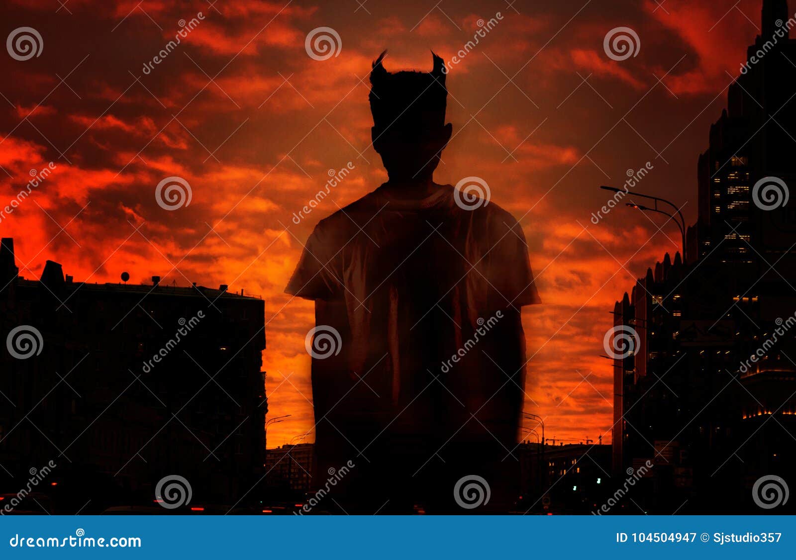 Silhouette of the Devil on the Background of the Red Bloody Sky Stock ...