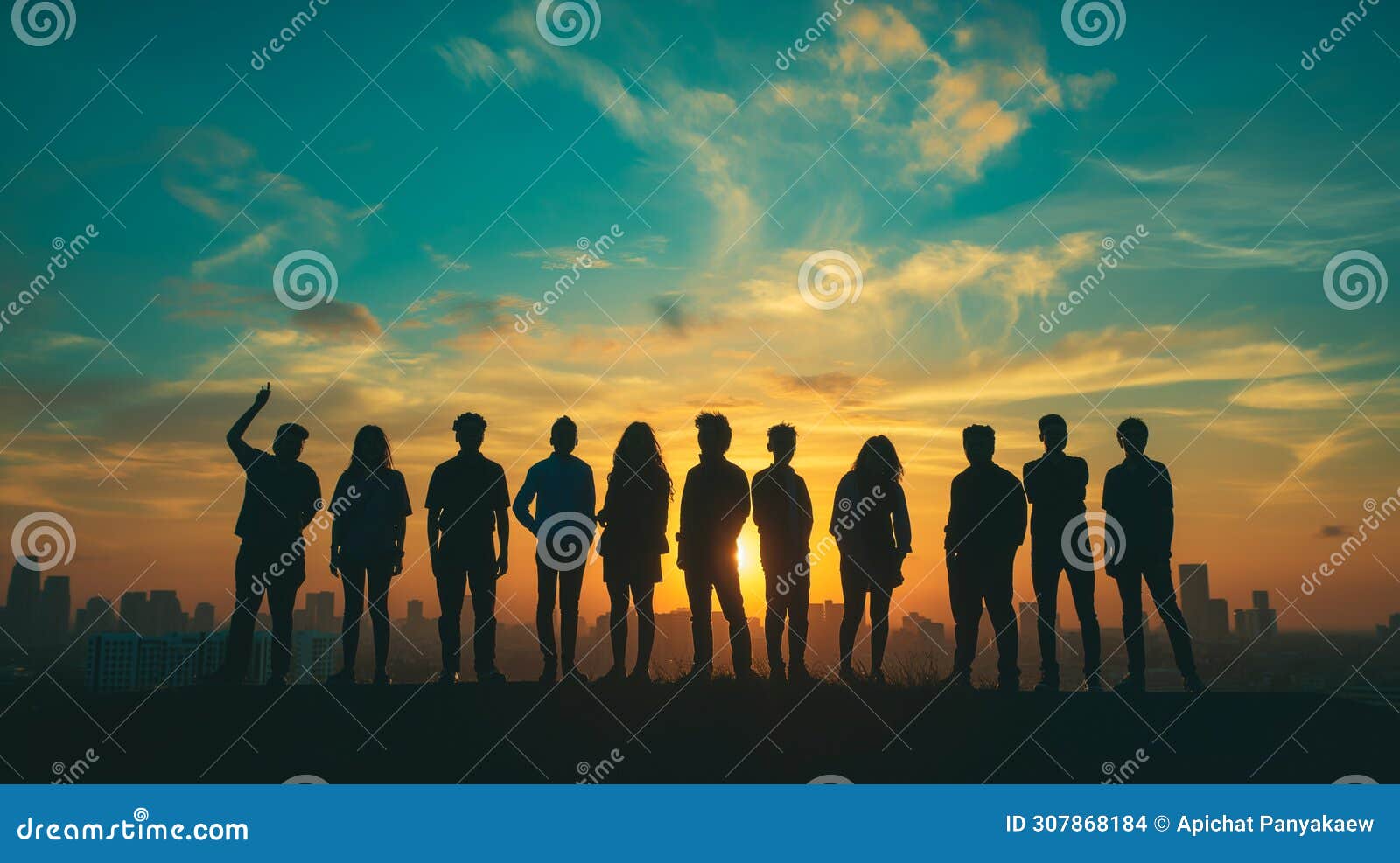 Group of People Celebrating on Mountain at Sunset Stock Photo - Image ...