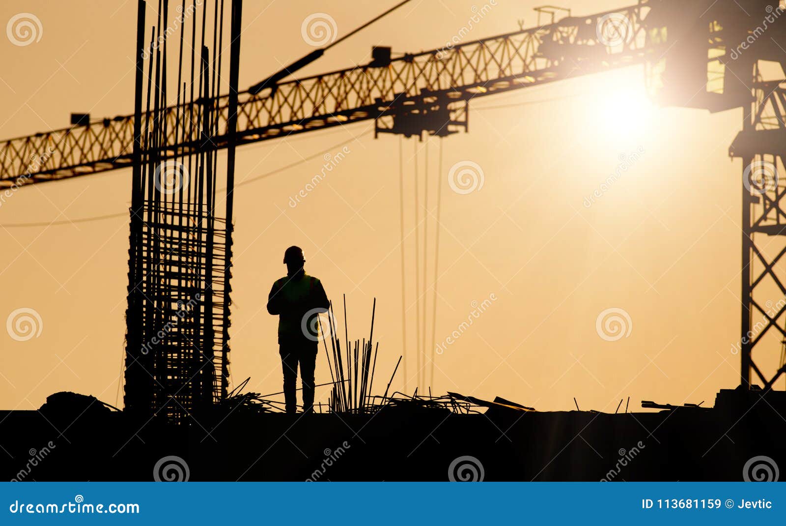Engineer And Construction Workers On The Tall Buildings, On The ...